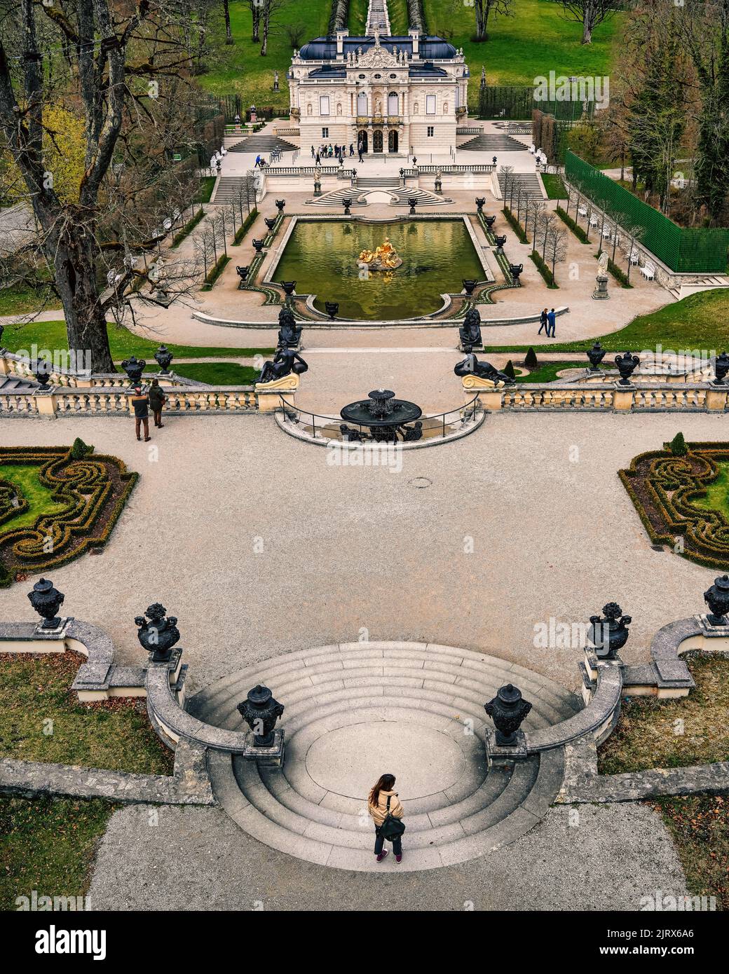 The vertical aerial view of the Neuschwanstein Castle and garden in ...