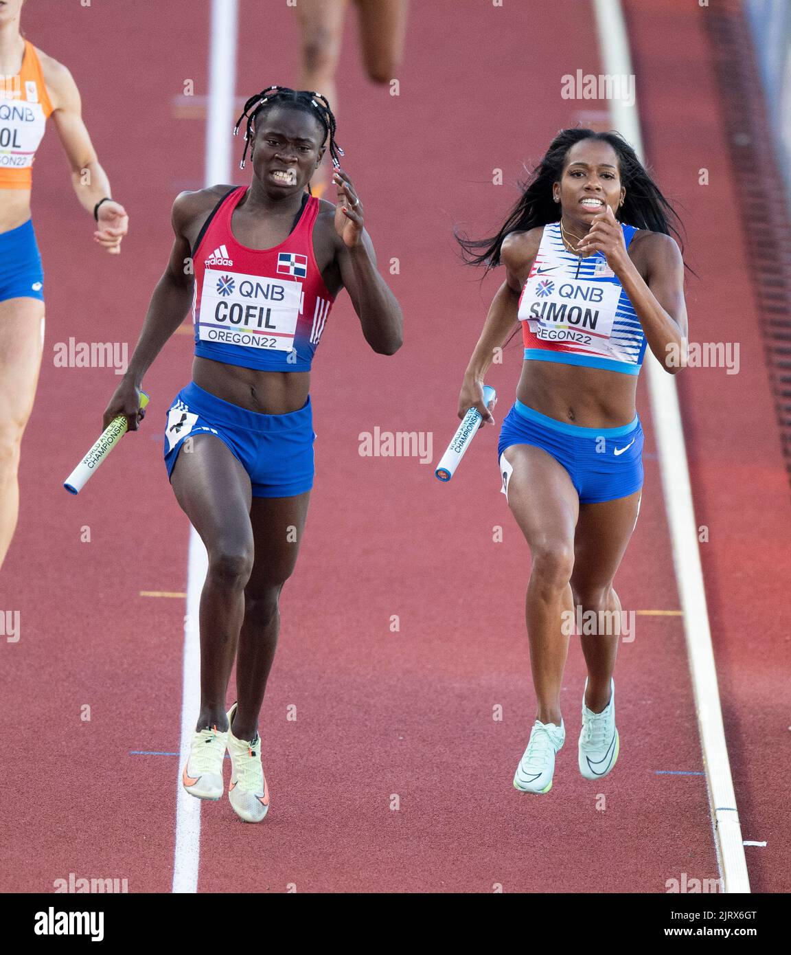 Fiordaliza Cofil and Kennedy Simon competing in the mixed relay final ...