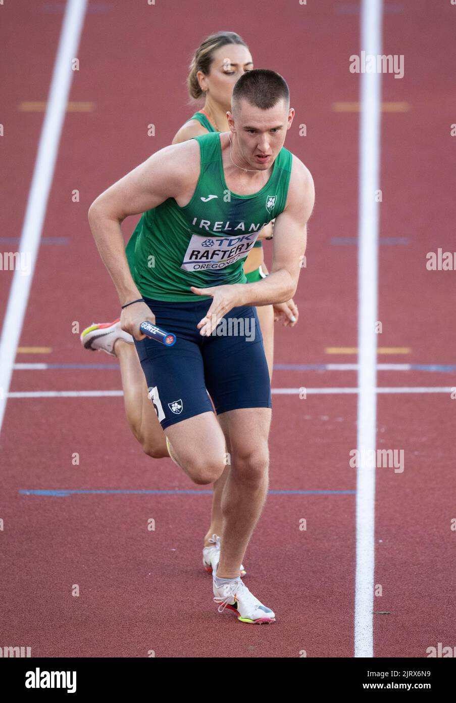 Jack Raftery competing in the mixed relay final at the World Athletics ...
