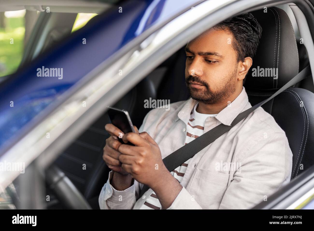 Indian man in car hi-res stock photography and images - Alamy