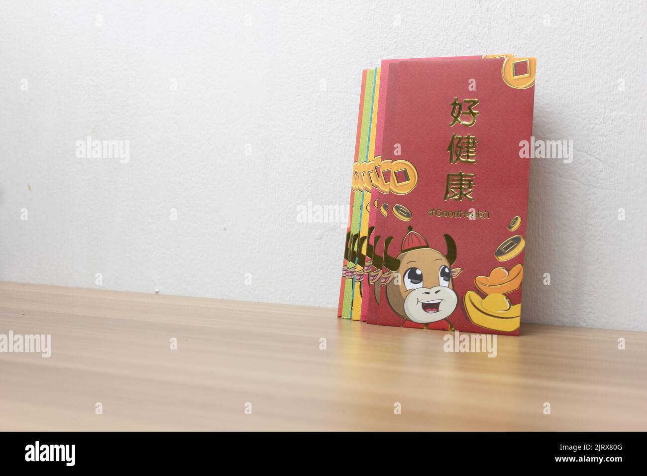A closeup shot of a traditional gift of red pockets (Hong bao) for ...