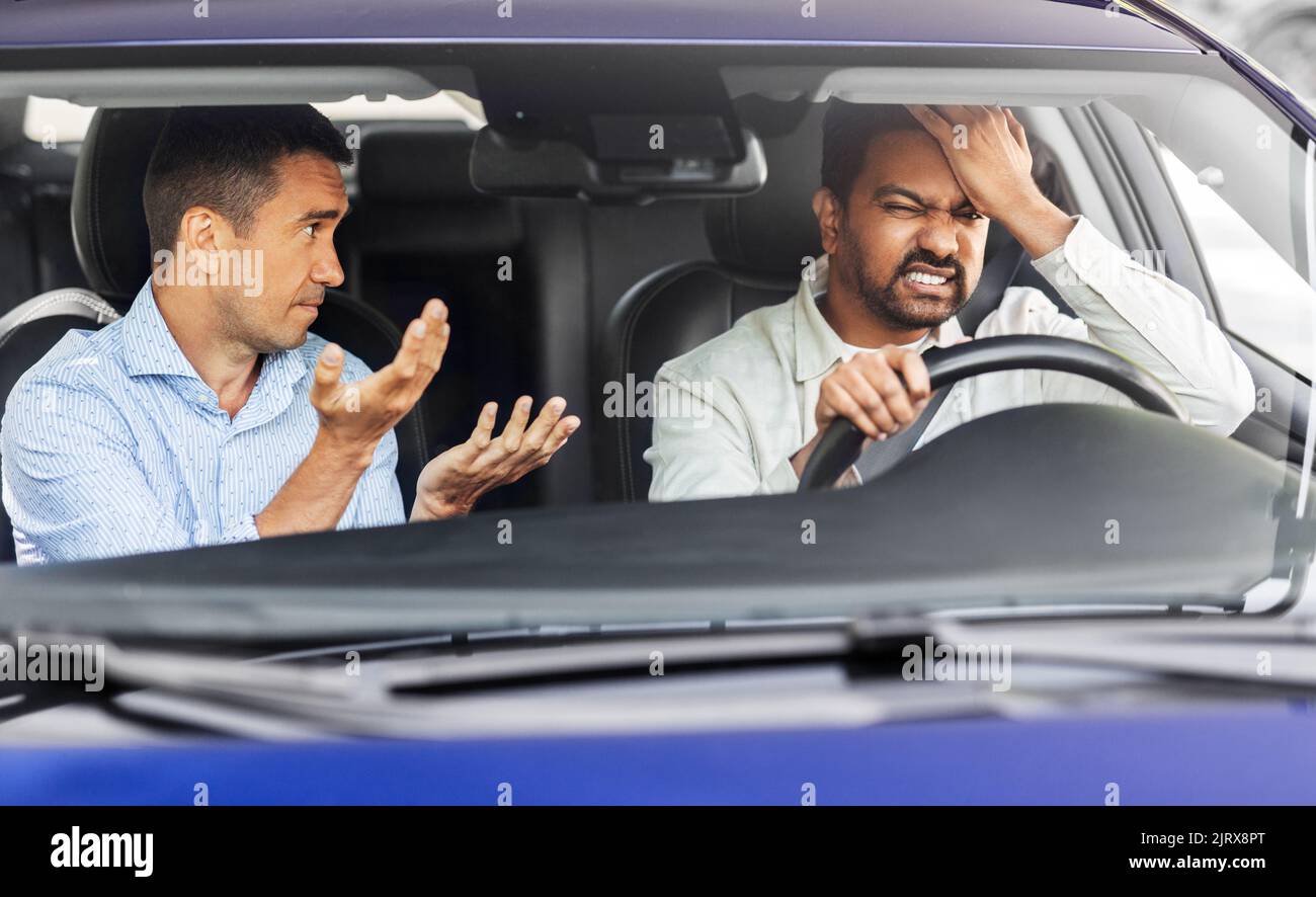 car driving instructor talking to man failed exam Stock Photo - Alamy