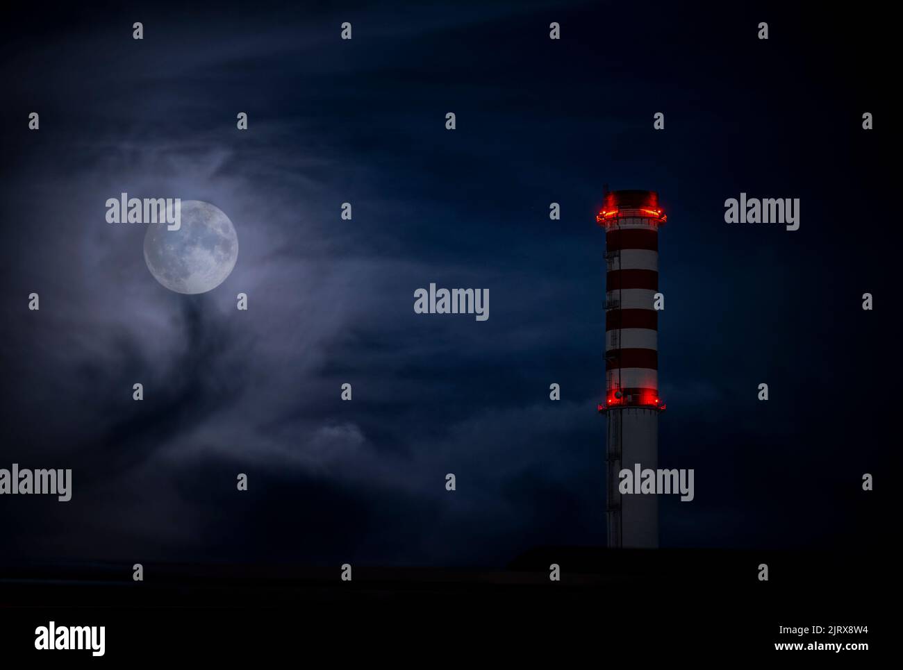 Heating plant tower lit by the full moon on the outskirts of Zagreb ...