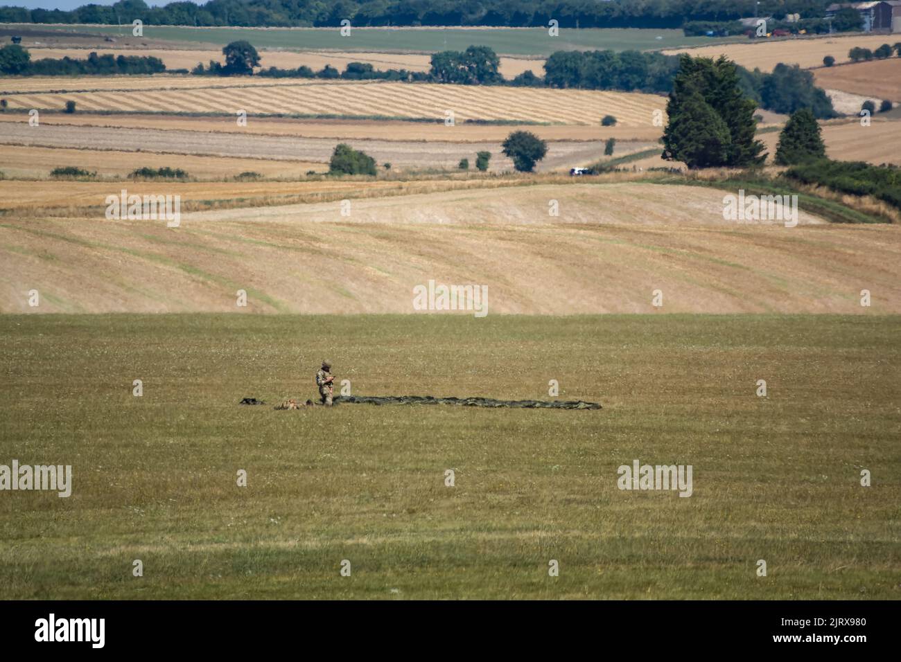 British army paratrooper preparing to move out from an airborne assault ...