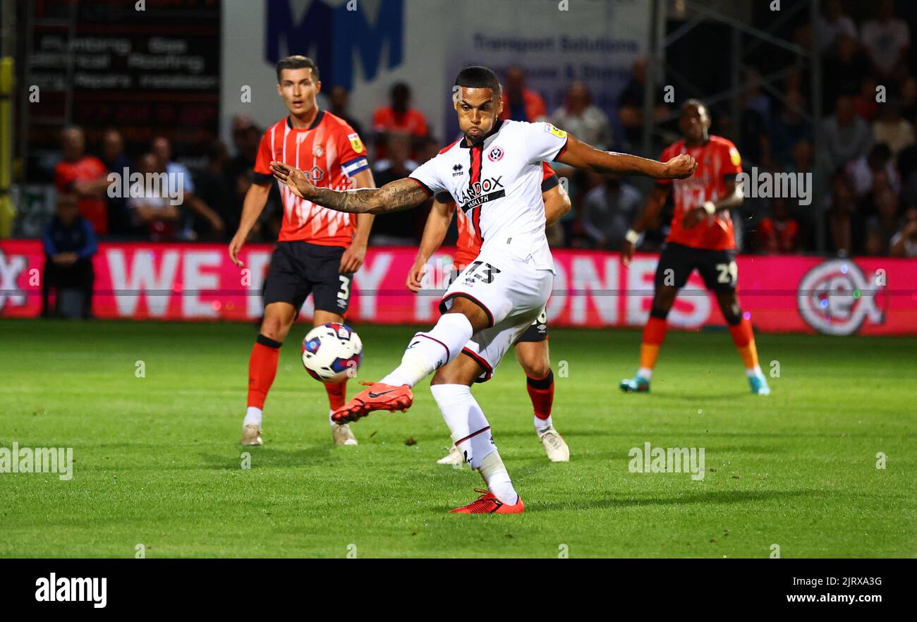 Luton, UK. 26th August 2022. Max Lowe of Sheffield Utd takes a shot ...