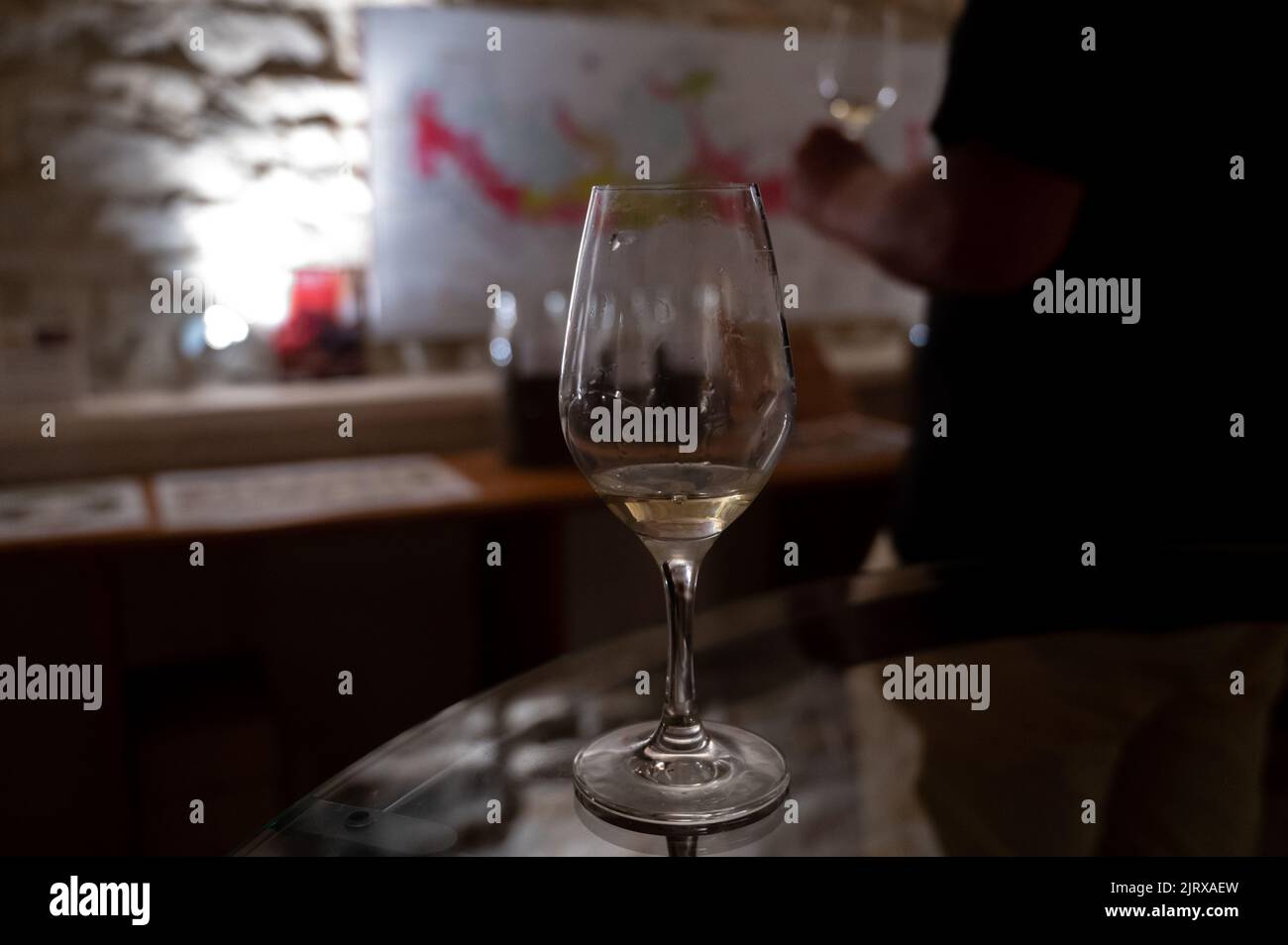 Wine tasting in underground cellars caves of French wine domain in ...