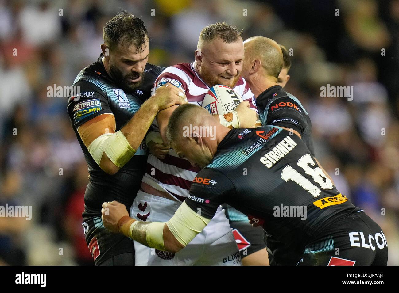 Curtis Sironen #16 and Alex Walmsley of St Helens tackle Brad Singleton ...
