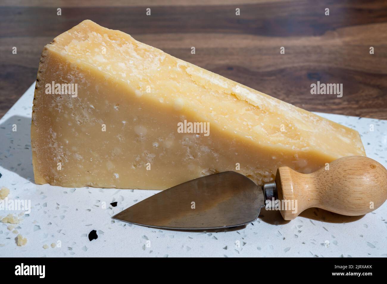 Italian cheese collection, piece of old matured grana padana cheese ...