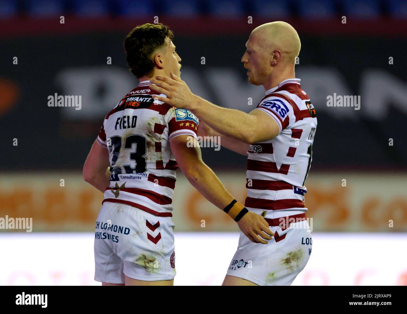 Wigan Warriors' Jai Field (left) celebrates after scoring a try during ...