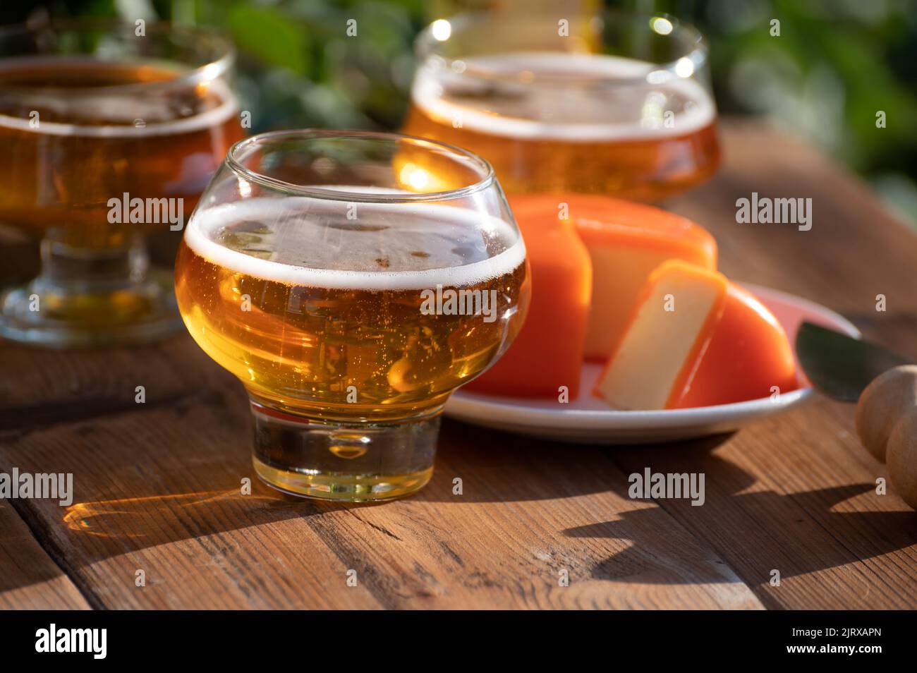 Food and drink pairing, apple cider in glasses produced on organic farm ...