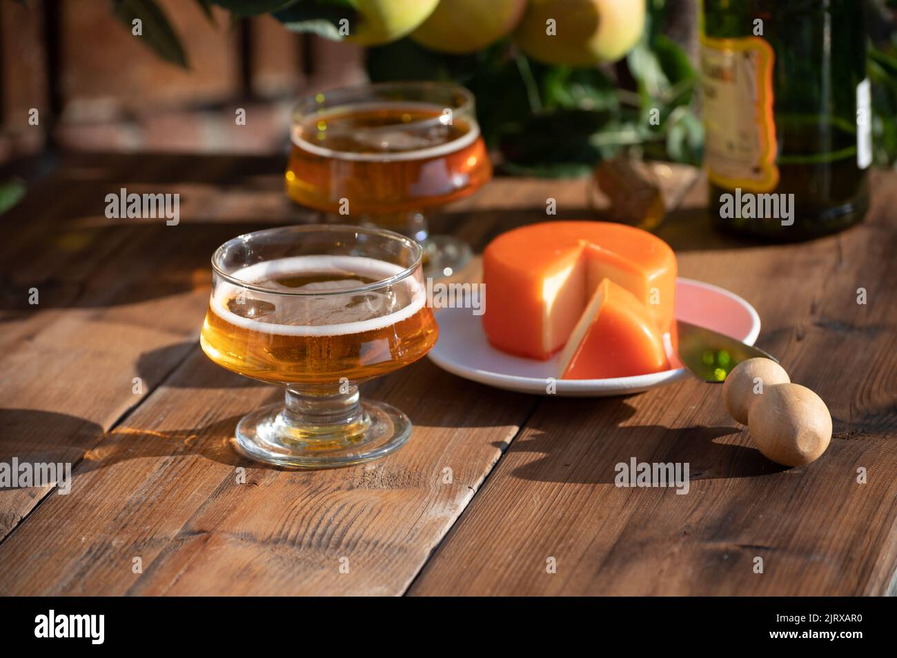 Food and drink pairing, apple cider in glasses produced on organic farm ...
