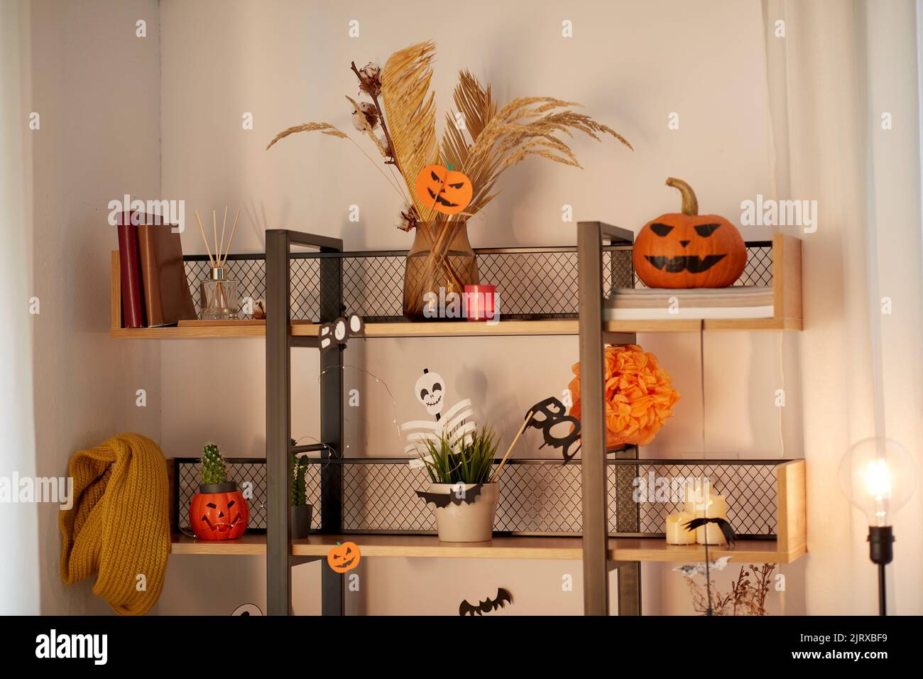 shelf with halloween decorations at home Stock Photo - Alamy