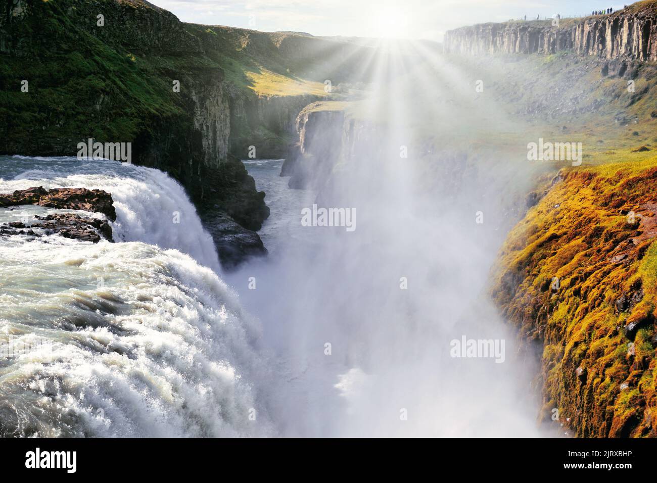 Sun shining over Gullfoss waterfall in Iceland Stock Photo - Alamy