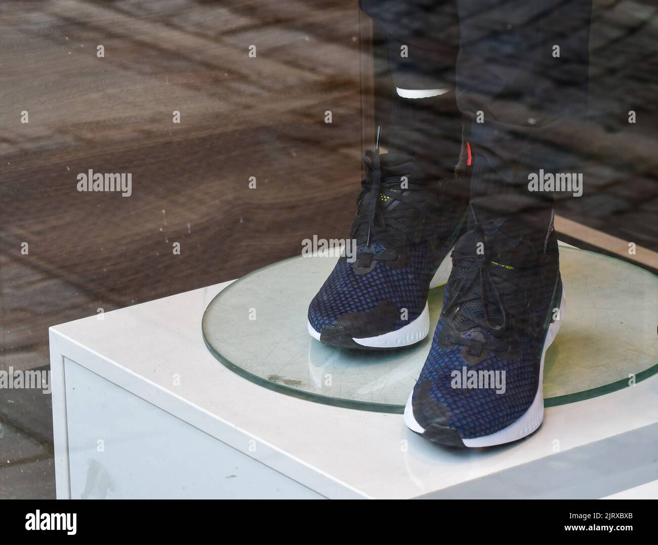 Shoes and mannequin in a shopping window Stock Photo - Alamy