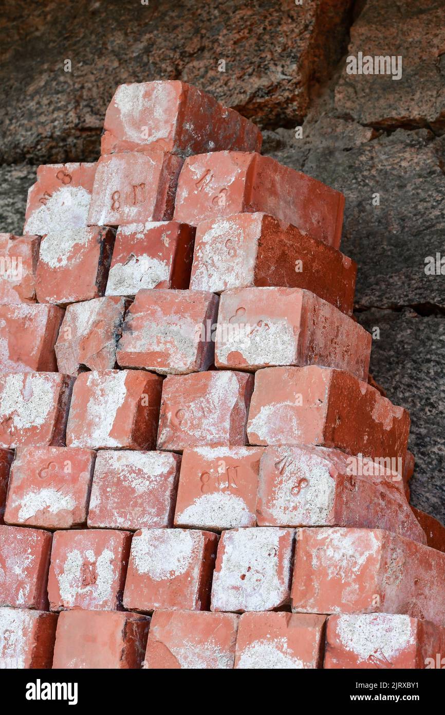 Red bricks lying on top of each other, concept of building Stock Photo ...