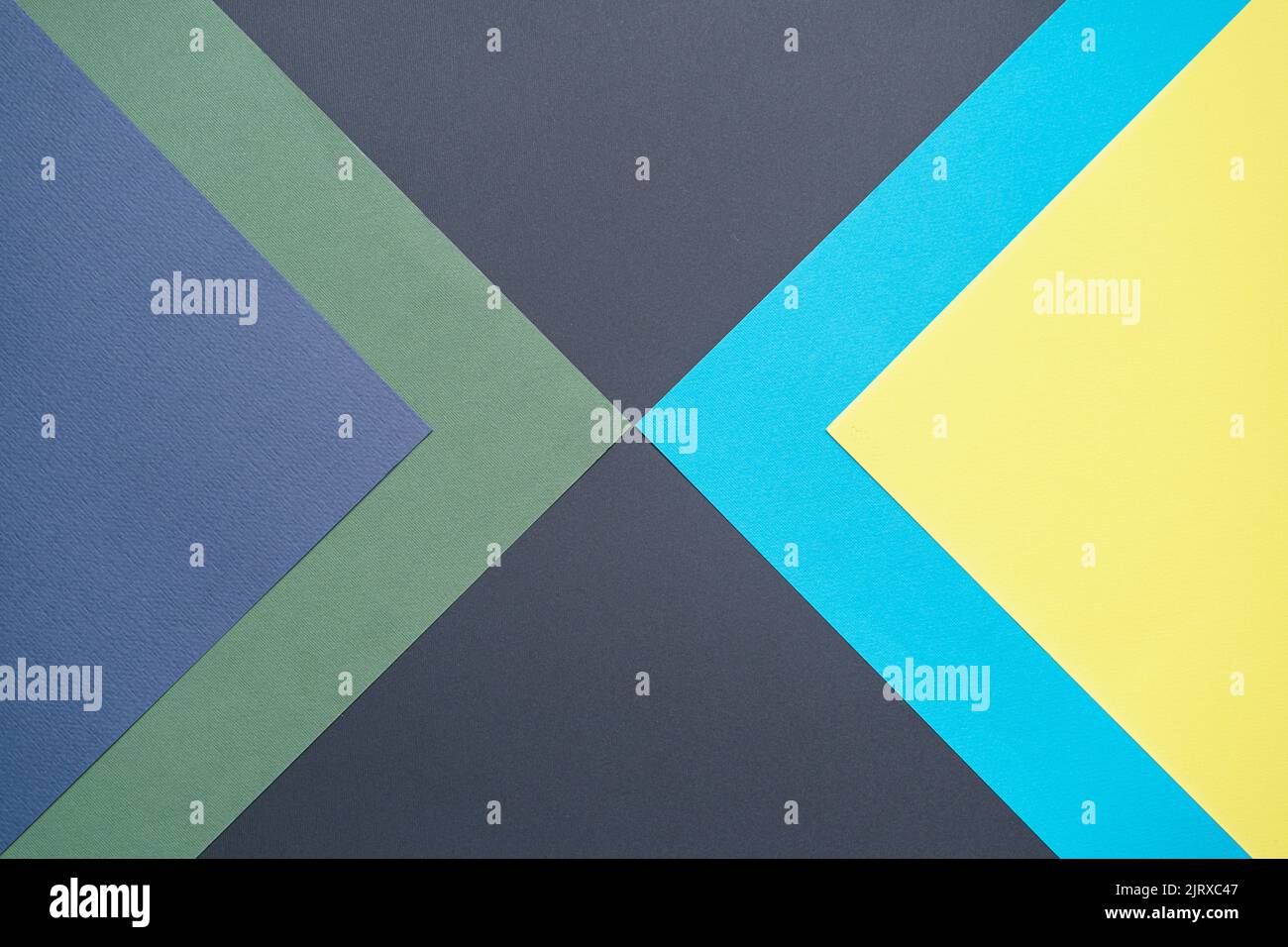 Blue, yellow, black, green, five tone color paper background with ...