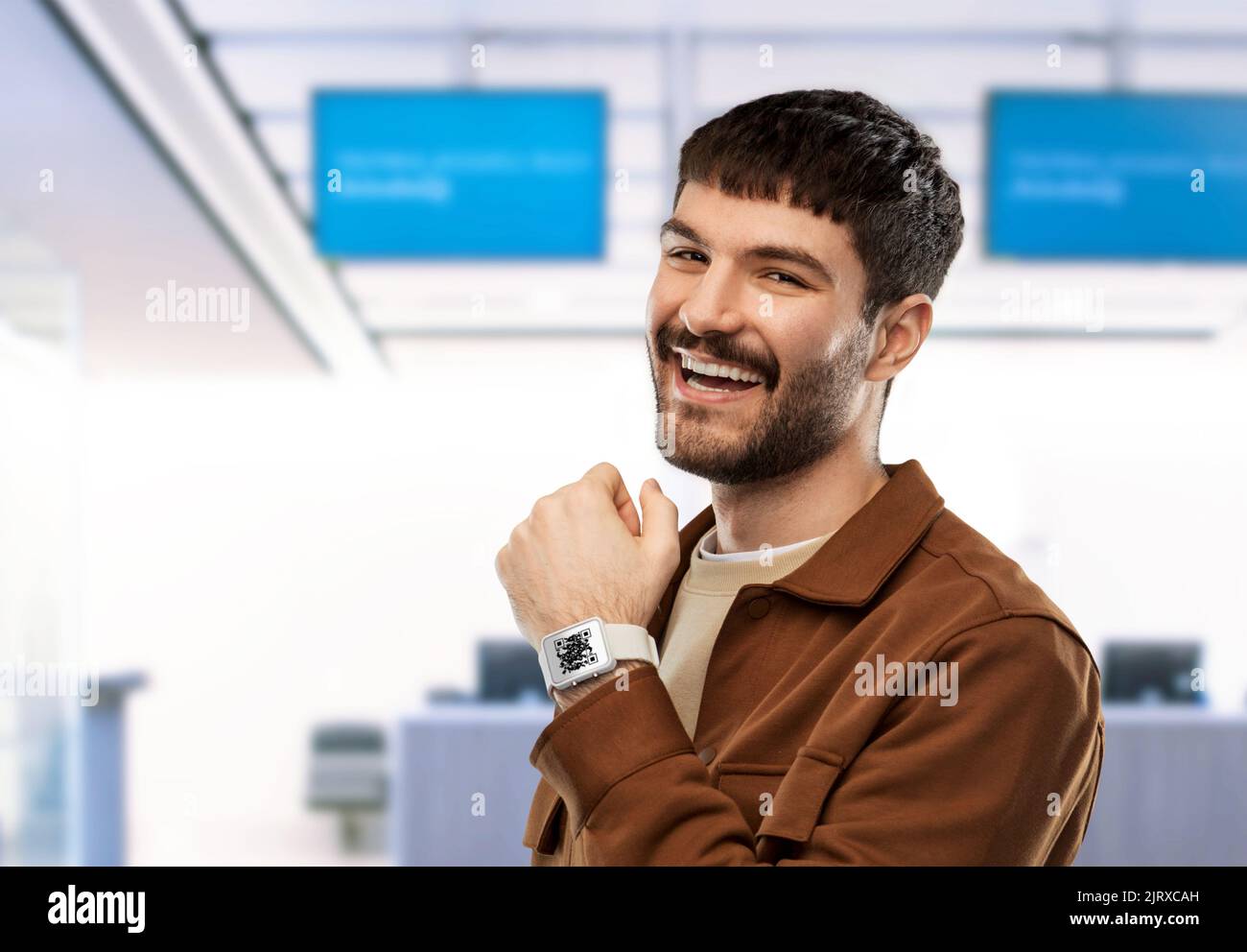man showing smart watch with qr code on screen Stock Photo - Alamy