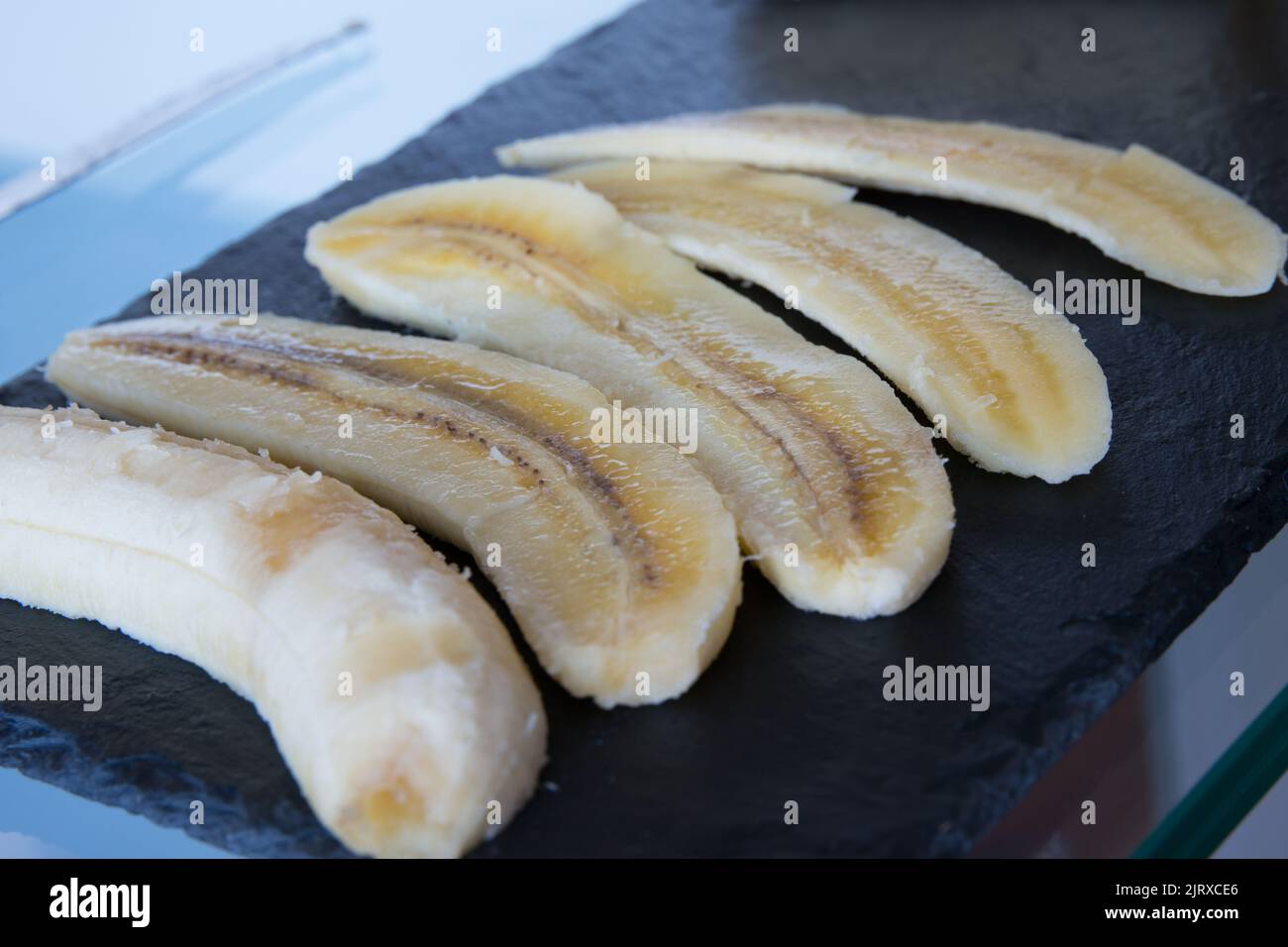 Banana slice black background hi-res stock photography and images - Alamy