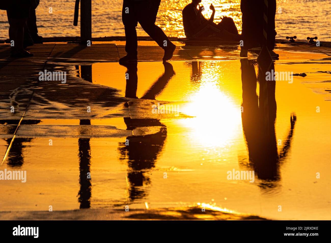 Puddle beach rain hi-res stock photography and images - Alamy