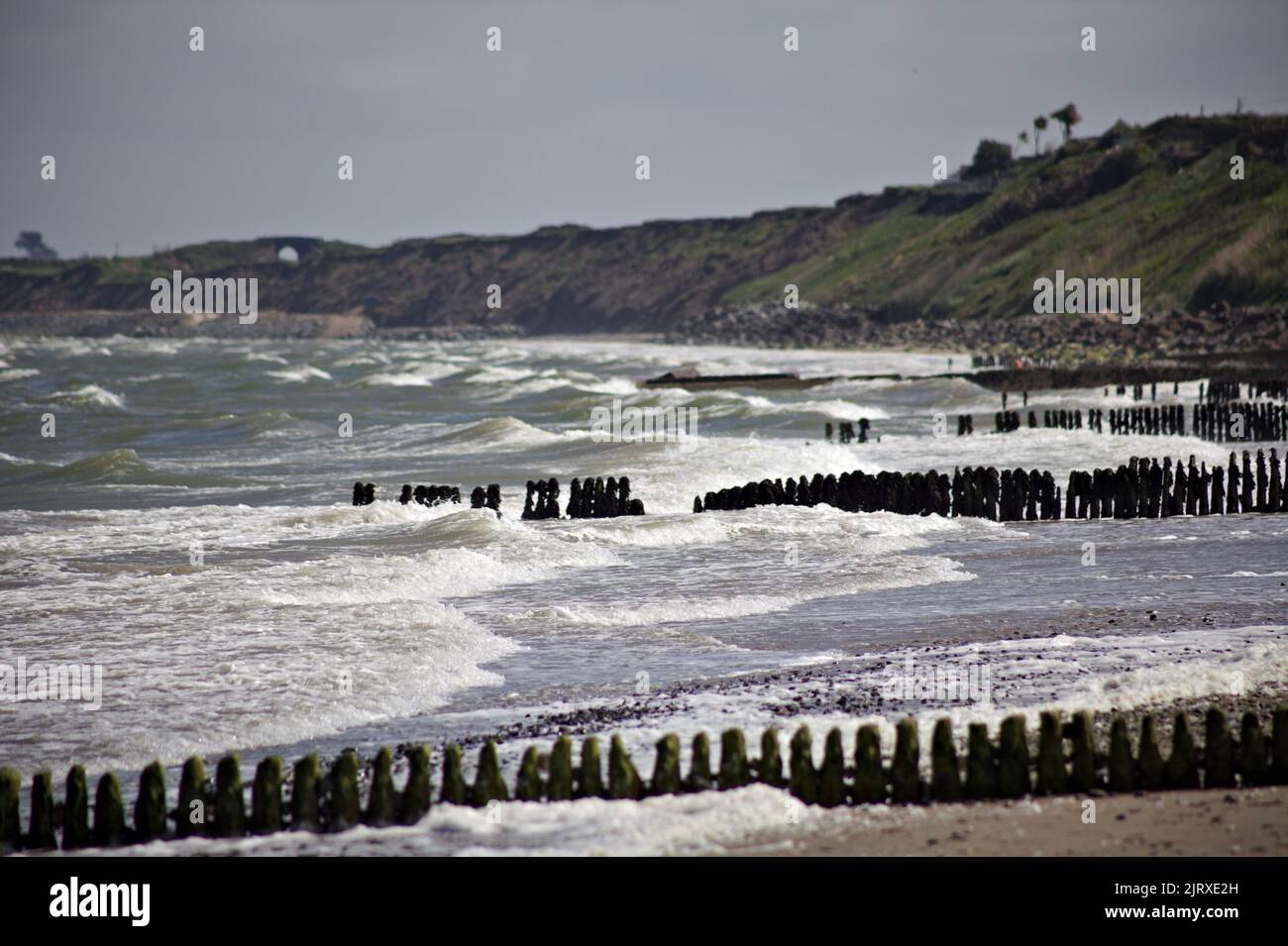 A selective of groins on the beach Stock Photo - Alamy