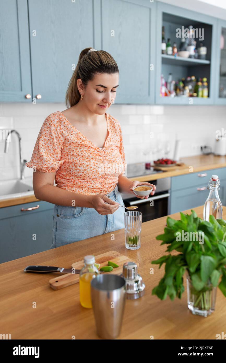 Making homemade non alcoholic mojito hi-res stock photography and ...