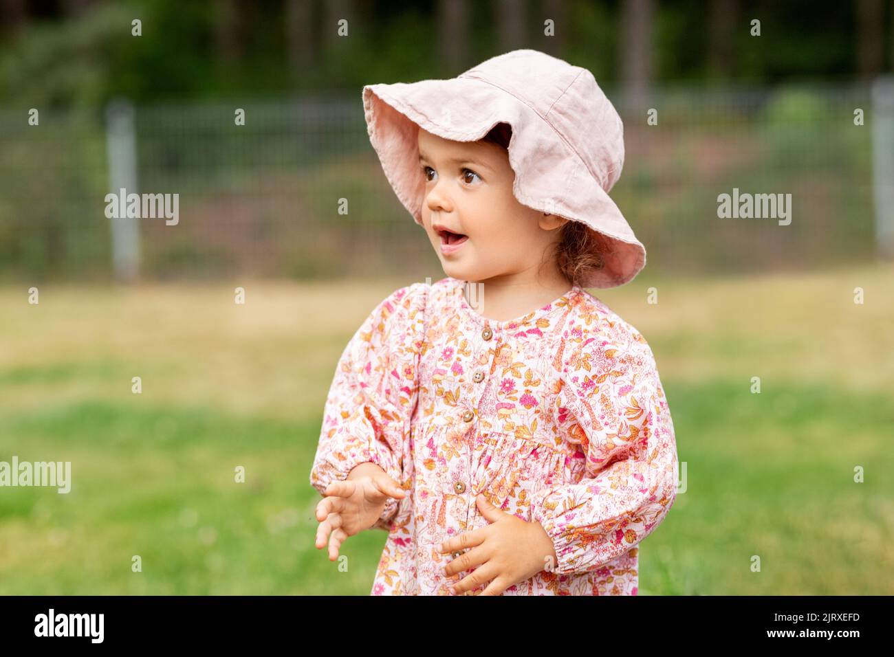 happy little baby girl outdoors in summer Stock Photo - Alamy