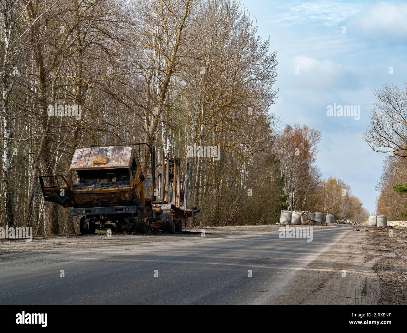Road traffic accident of a car with fire. Car accident. Road in the ...