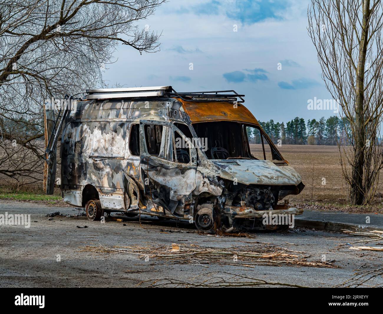 Road traffic accident of a car with fire. Car accident. Road in the ...