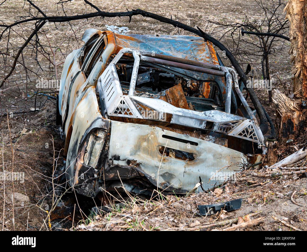 Road traffic accident of a car with fire. Car accident. Road in the ...