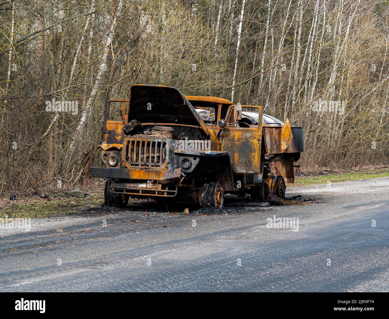 Road traffic accident of a car with fire. Car accident. Road in the ...