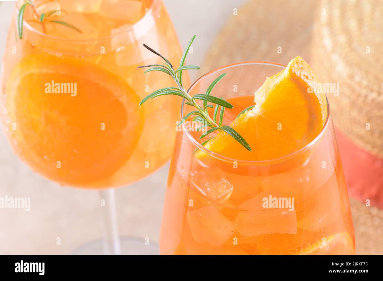 Italian aperitif aperol spritz cocktail in glass with ice, slice of ...