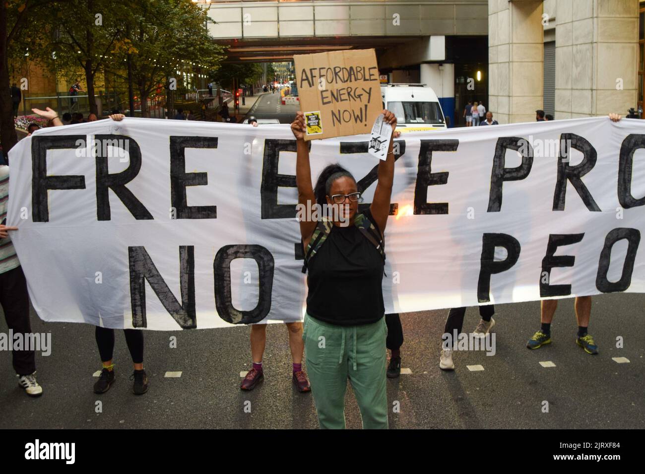 London, UK. 26th August 2022. Protesters block traffic with a large ...