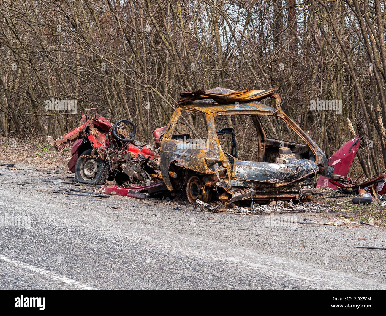 Road traffic accident of a car with fire. Car accident. Road in the ...