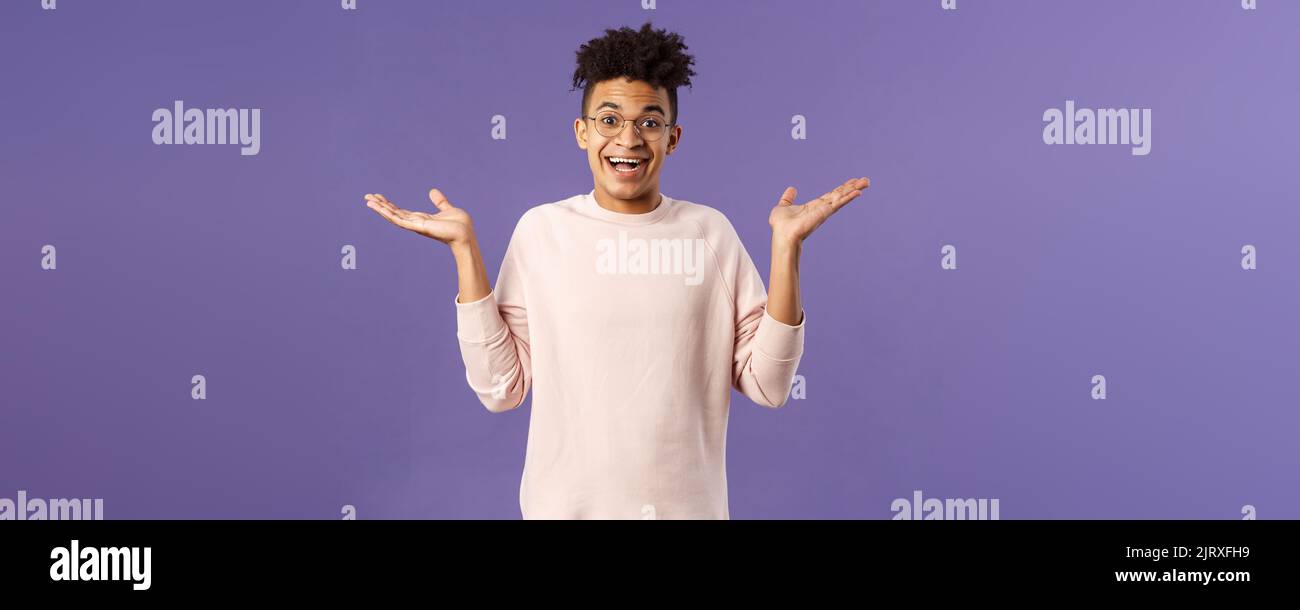 So what, I wear glasses. Portrait of unbothered, happy optimistic guy ...