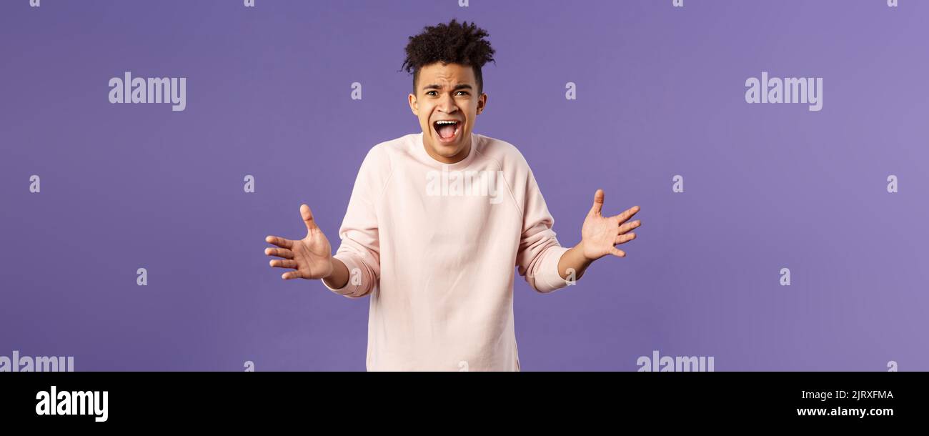 Portrait of concerned, upset and frustrated young man cant believe he ...
