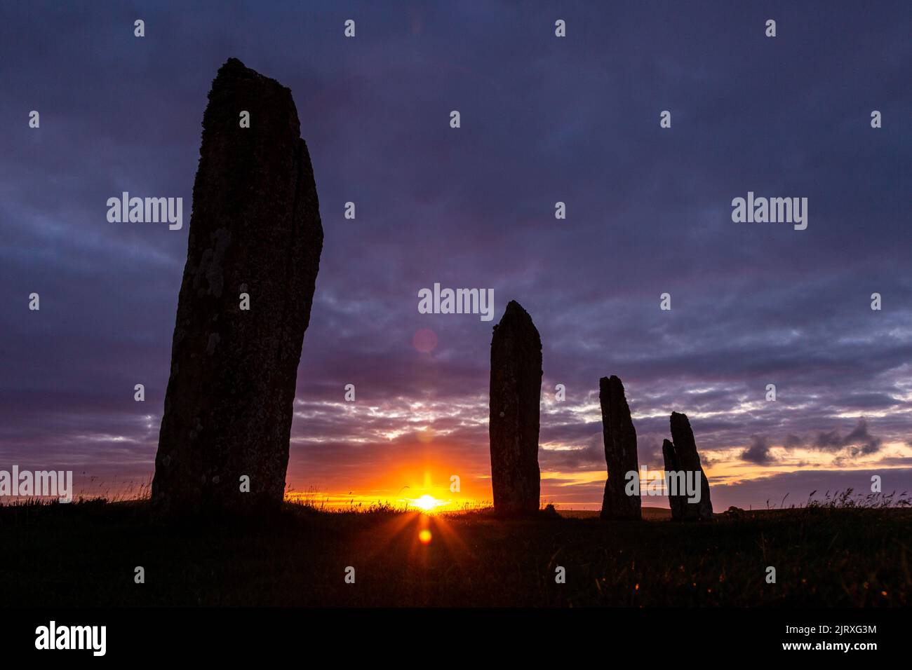 Orkney, UK. 26th Aug, 2022. The sun sets dramatically over the Ring of ...