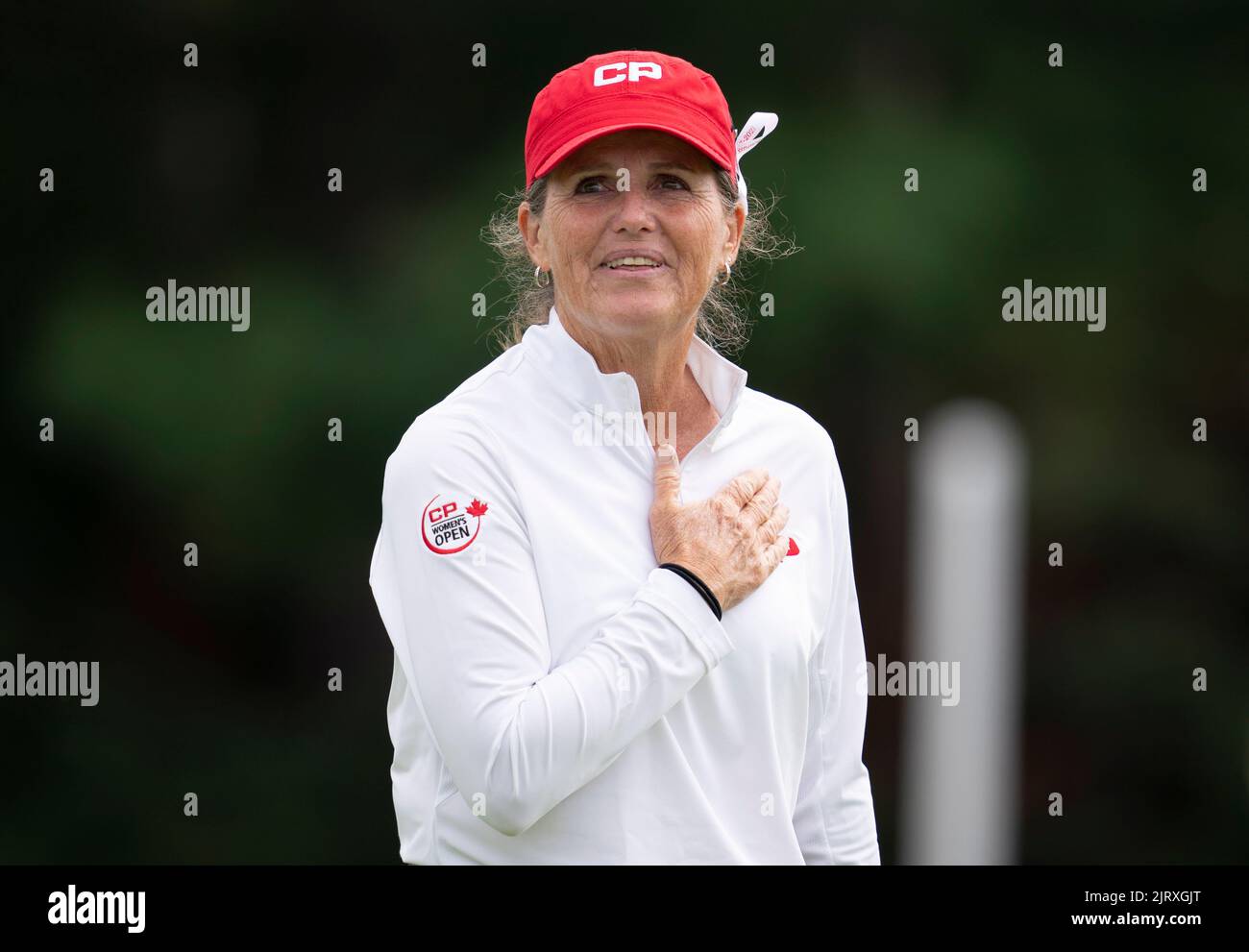 Canada’s Lorie Kane places her hand on her heart as she acknowledges ...