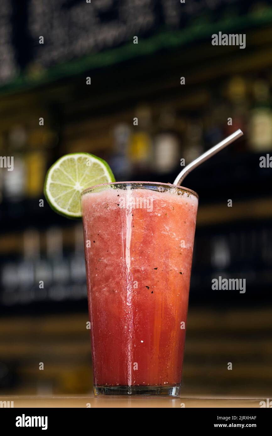 Strawberry shake served in a glass with a glazed rim at a restaurant ...