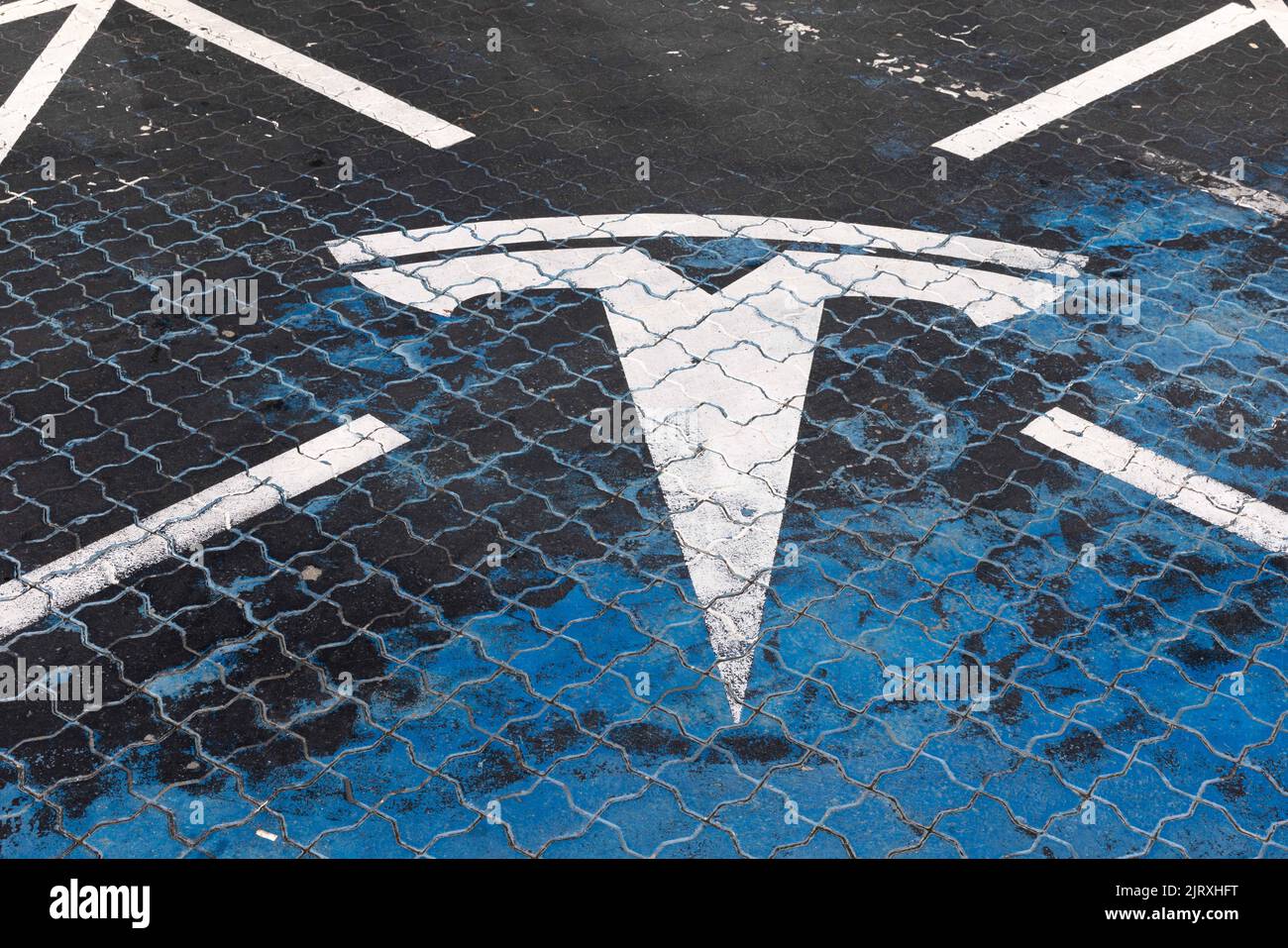 Tesla logo seen at a Tesla charging station seen in Bratislava. EVs are ...