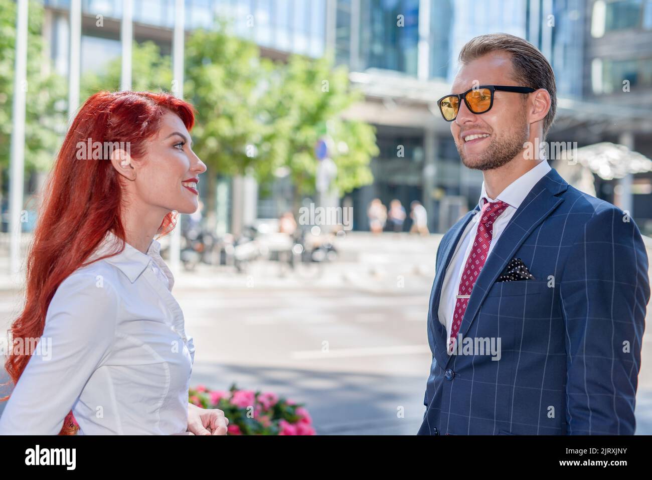 Business partners discussing together outdoor Stock Photo - Alamy