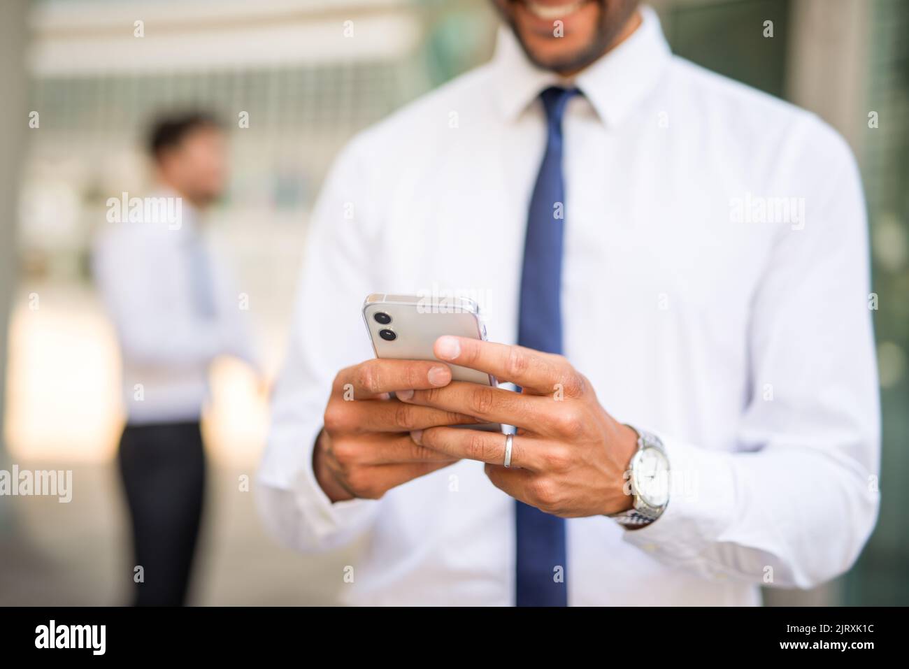 Man using mobile phone. Impersonal image, no face Stock Photo - Alamy