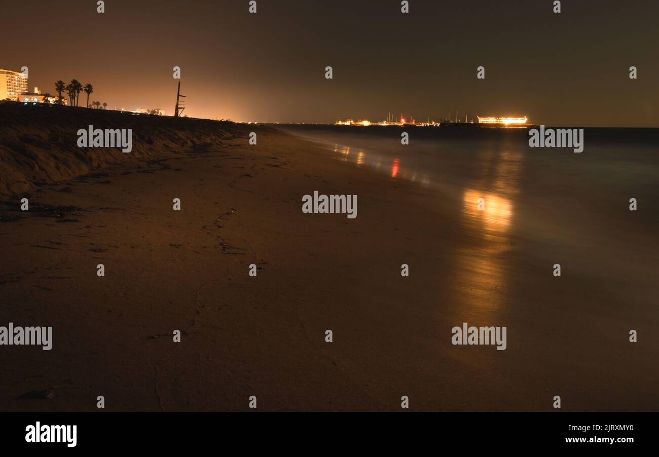 Coma Ruga at night - view of the beach Stock Photo - Alamy