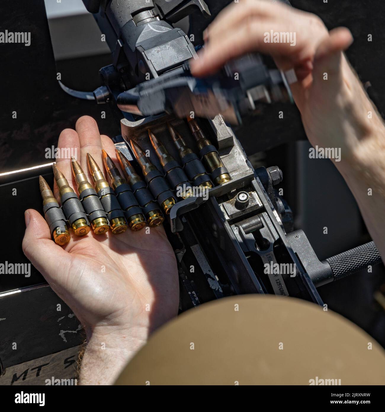 A U.S. Navy Sailor aboard the Amphibious Assault Ship USS Tripoli (LHA ...