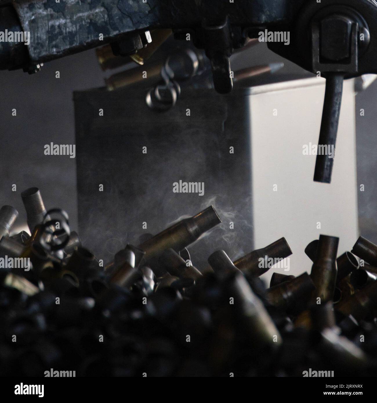 .50 caliber shells pile up during a live fire exercise aboard the ...