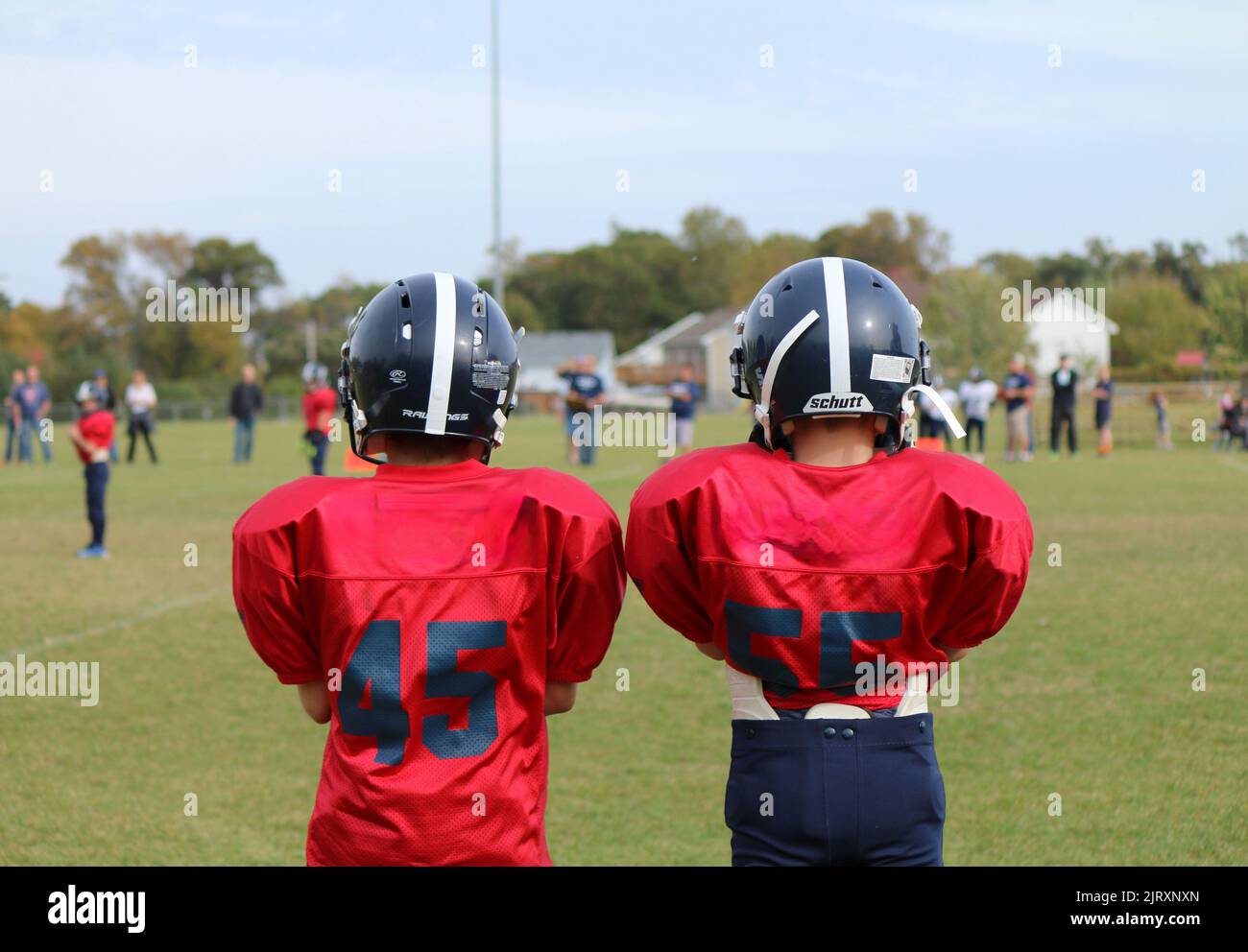 Kids playing football head hi-res stock photography and images - Alamy