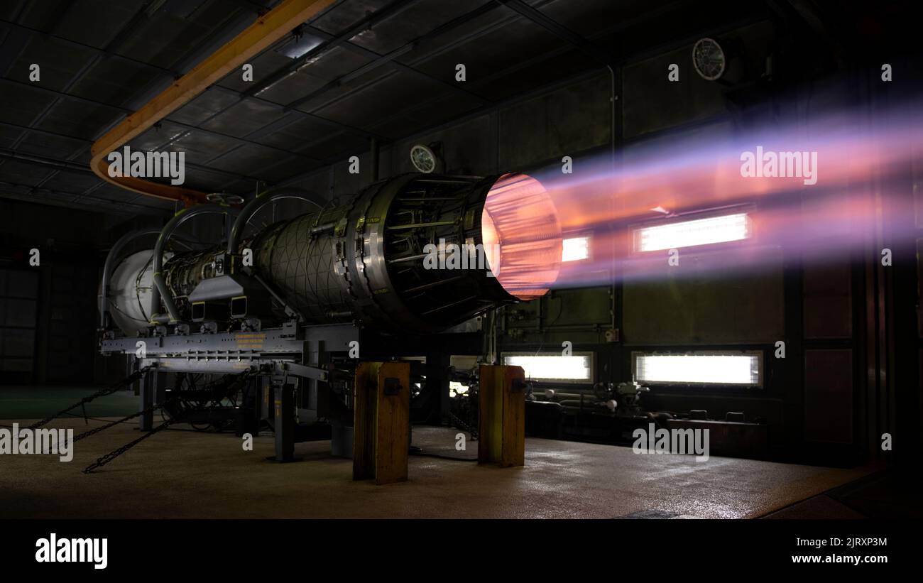 An F-15C Eagle engine runs at full afterburner inside the test cell at ...