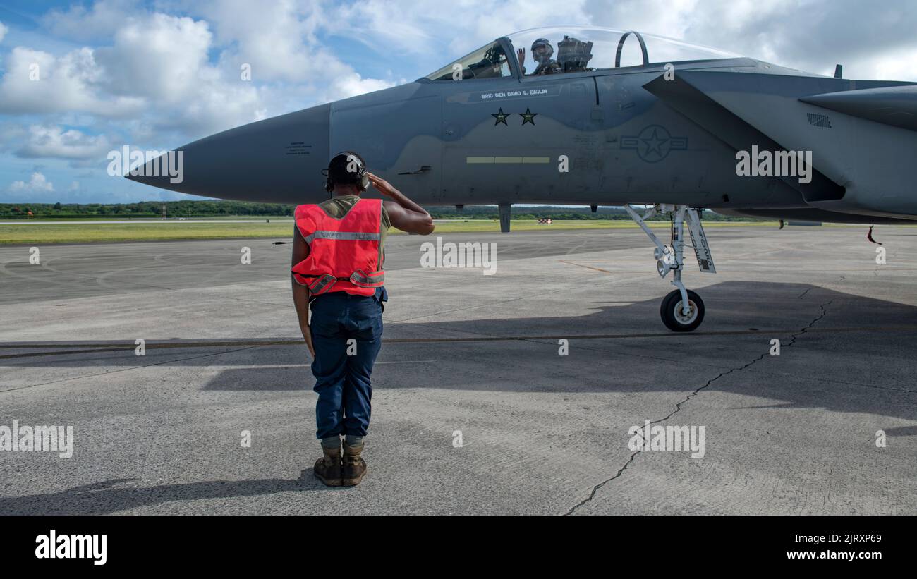 A crew chief assigned to the 44th Aircraft Maintenance Unit salutes the ...