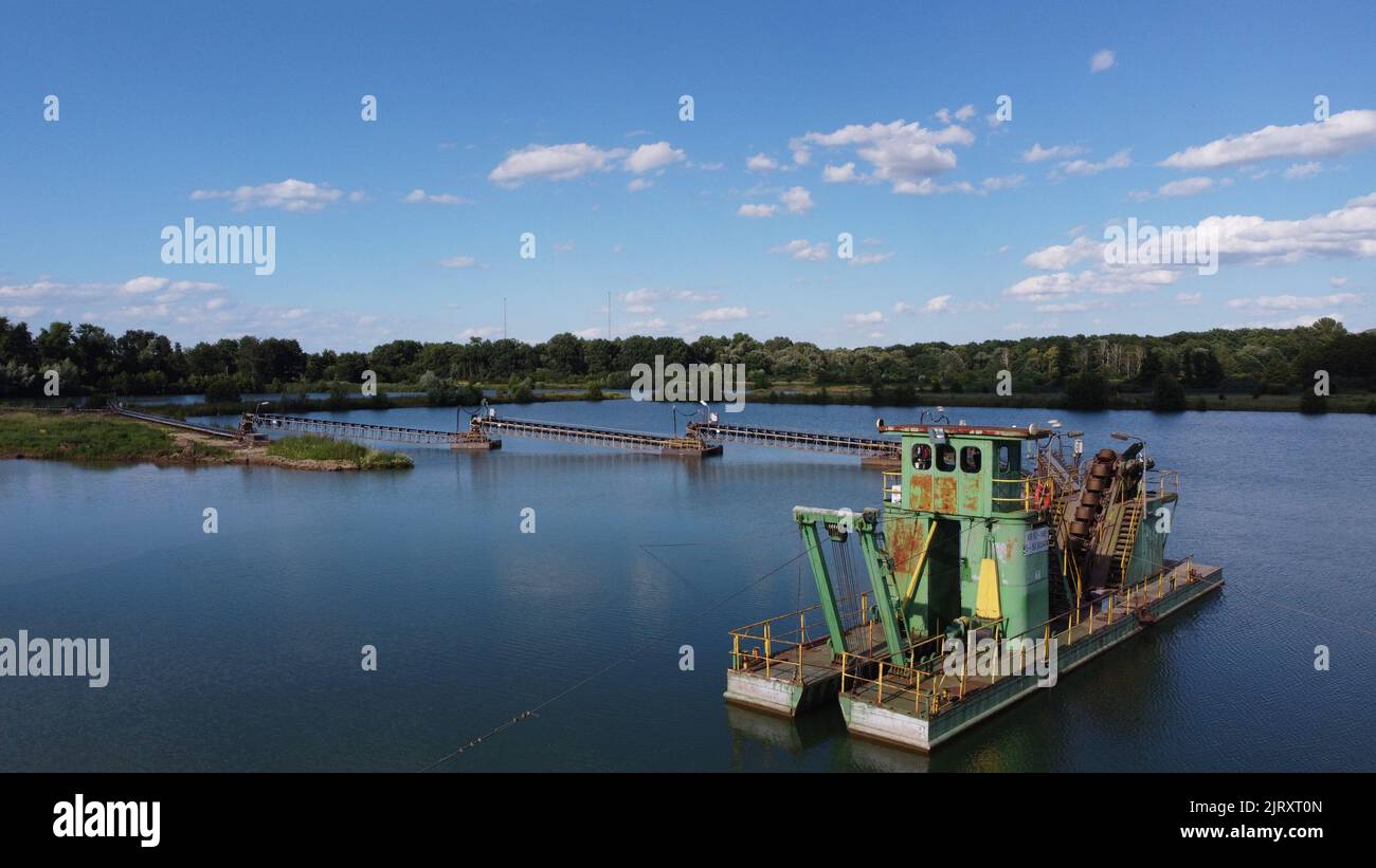 floating bucket excavator in quarry for sand Czech republic Podebrady ...