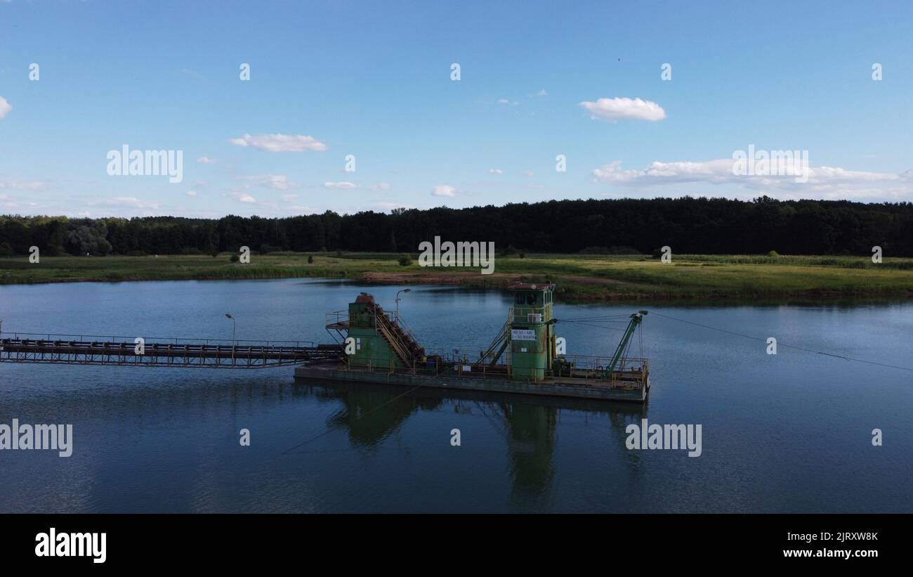 floating bucket excavator in quarry for sand Czech republic Podebrady ...