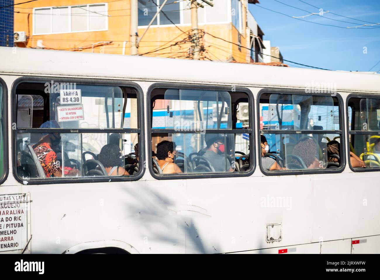 A view of passengers wearing a protective mask against covid-19 inside ...